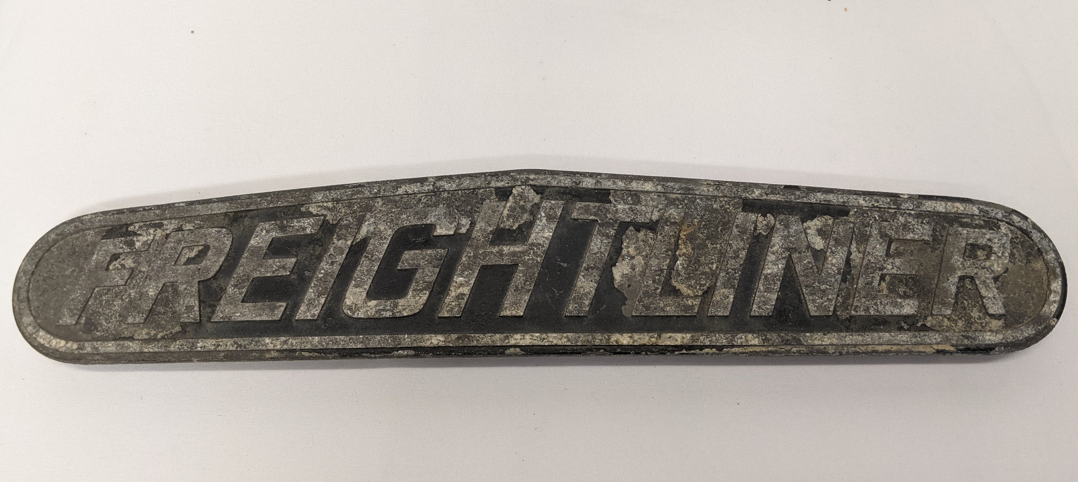 Freightliner Truck Nameplate Emblem (22-39676-001) - Heavy Wear